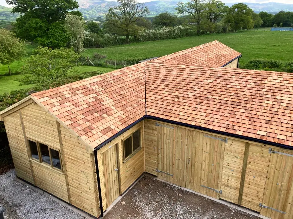 A Timber Garage With A Huge Workshop Case Study a-timber-garage-with-a-huge-workshop-case-study